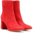 Bottes rouges en vinyle Bershka - Bottez en rouge ! - Elle